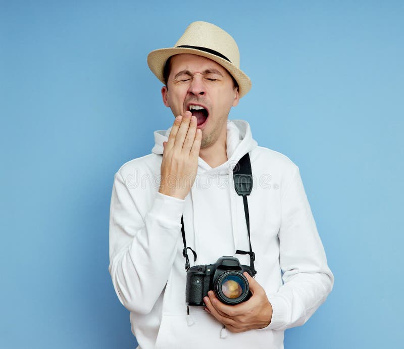 Man with the Camera is Tired and Yawns Stock Photo - Image of isolated ...