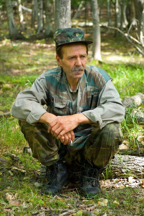 Man in Camouflage 20 stock image. Image of portrait, green - 10672915