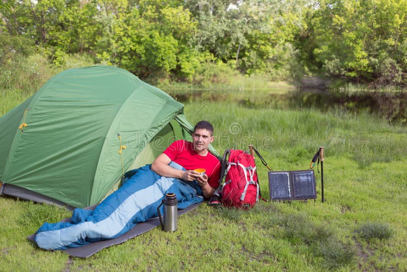 The Man at the Campsite in the Woods . Stock Image - Image of hiking ...