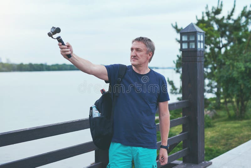 Man Capturing Herself with Personal Camera Stock Image - Image of male ...