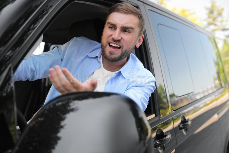 Emotional Man in Car. Aggressive Driving Behavior Stock Photo - Image ...