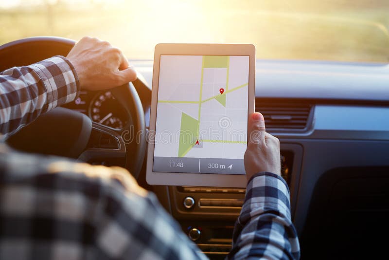 Man in Car and Holding Tablet with Map Gps Navigation Stock Photo ...