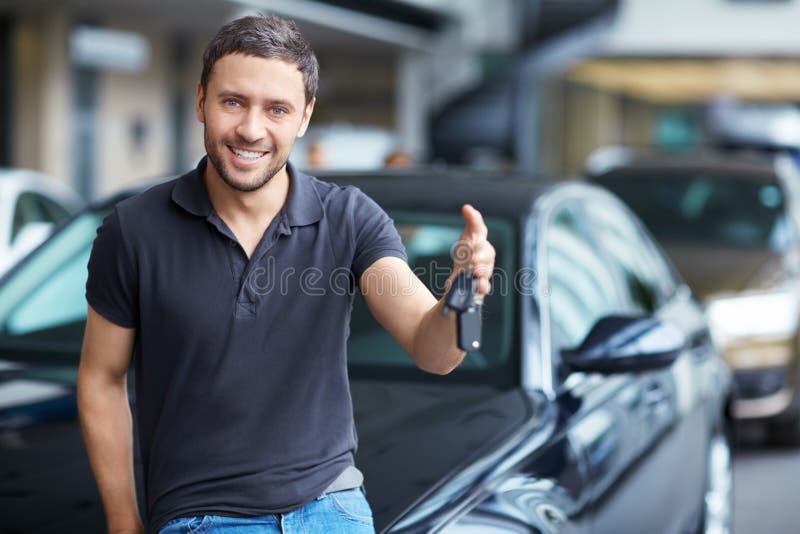 Happy Car Owner at the Dealership. Handsome Young Men Sitting at Stock ...