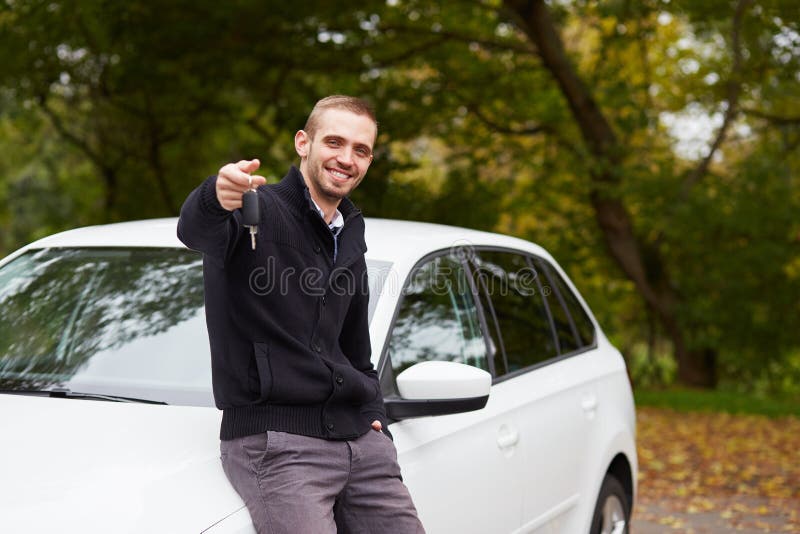 Man with car keys stock photo. Image of handsome, sale - 63197650
