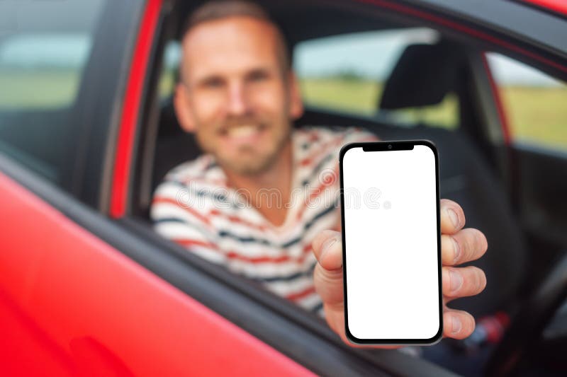 A Man in a Car Shows a Smartphone. Stock Photo - Image of person, male ...