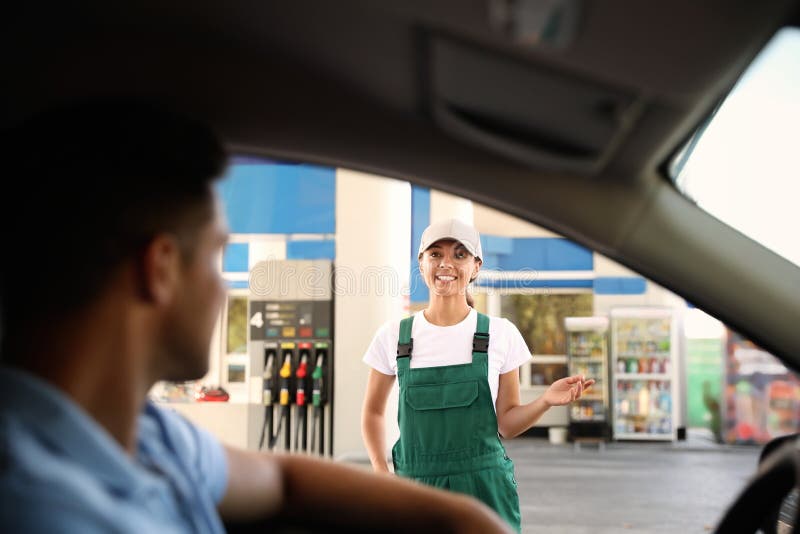 Gas Station Worker with Fuel Nozzle on White Background Stock Image ...