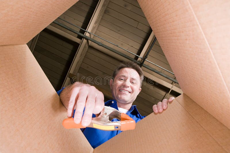 Man and cardboard box stock image. Image of collar, looking - 62806019