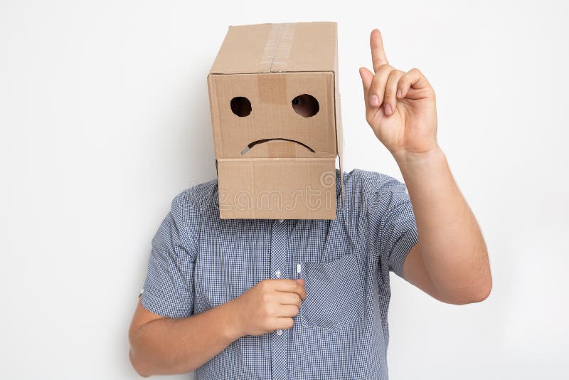 A Man with a Cardboard Box on His Head, a Sad Smiley Stock Image ...