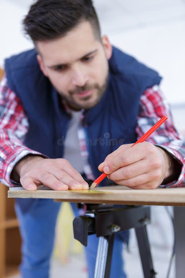 Man Carpenter in Home Studio Working with Wood Stock Image - Image of ...