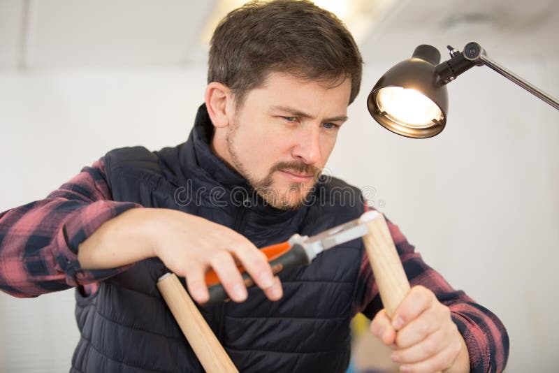 Man Carpenter with Screwdriver in Hand Working Stock Photo - Image of ...