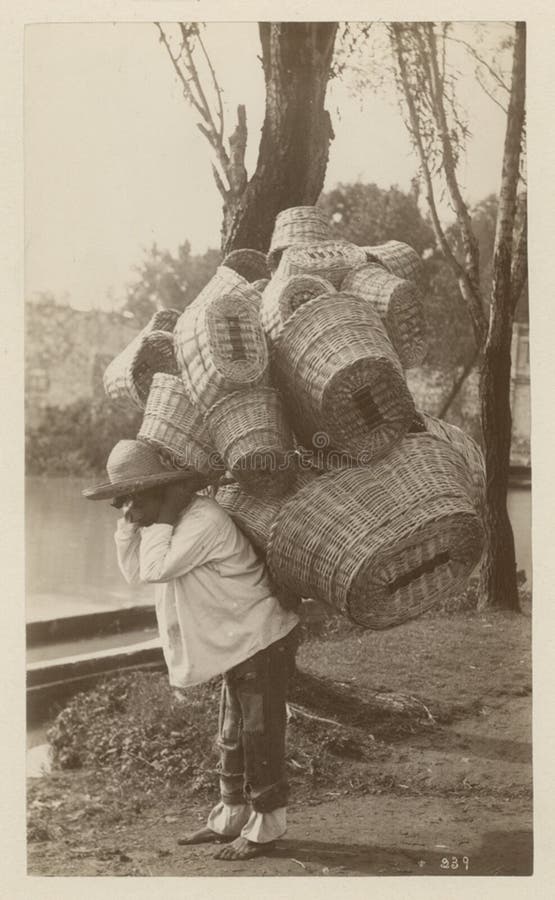 [Man Carrying Baskets] Picture. Image: 222613336