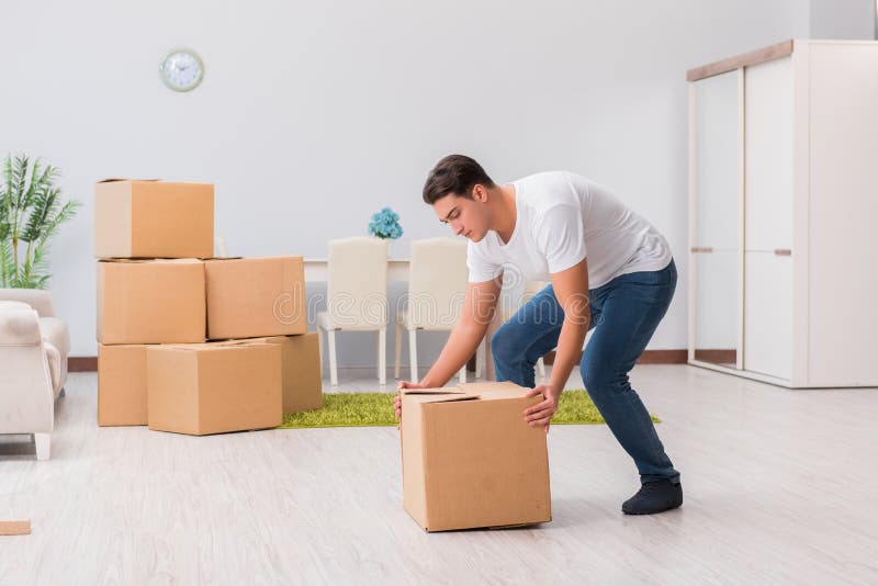 The Man Carrying Boxes at Home Stock Image - Image of movers, container ...