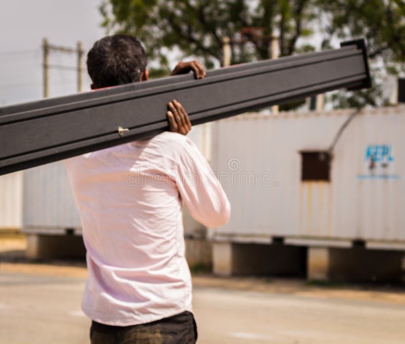 Man Carrying a Pole (AVCC Profiler) Stock Image - Image of pole ...