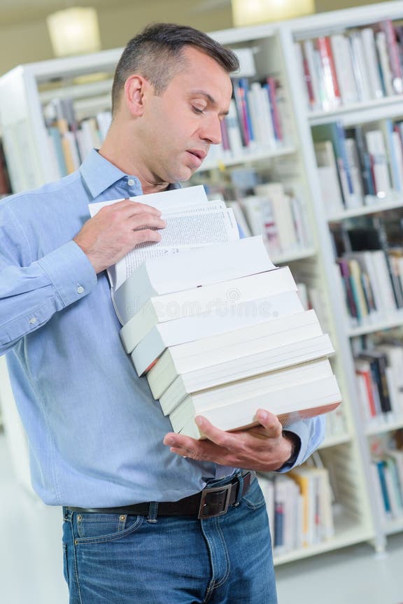 Man Carrying Precarious Stack Books Stock Image - Image of careful ...