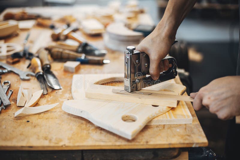 The Carpenter Works with a Tree Stock Image - Image of carving, chisel ...