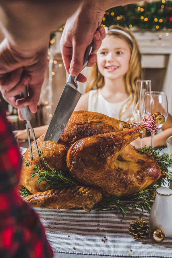 Man carving roasted turkey stock image. Image of dinner - 88502657