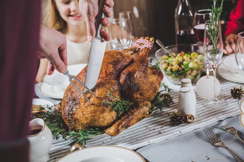 Man carving roasted turkey stock image. Image of dinner - 88503165
