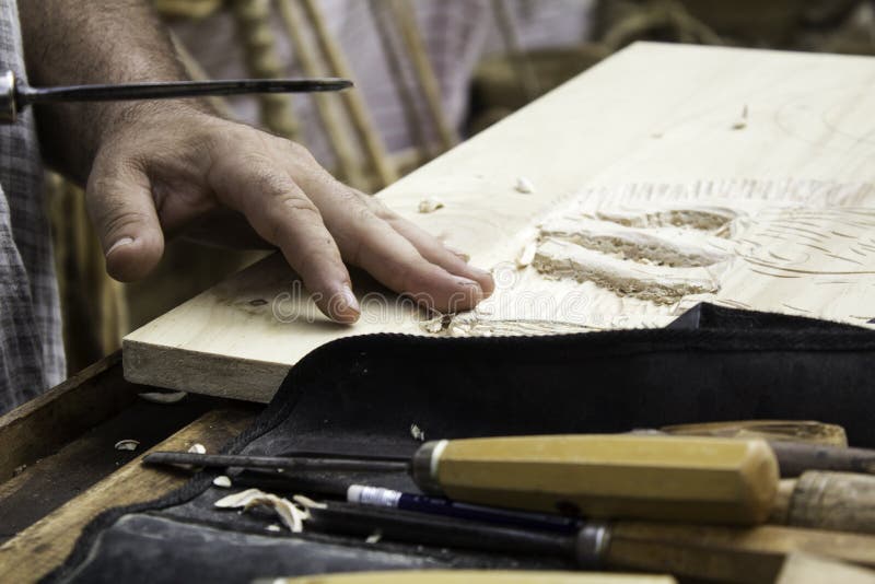 Man carving wood stock image. Image of color, decoration - 94743661