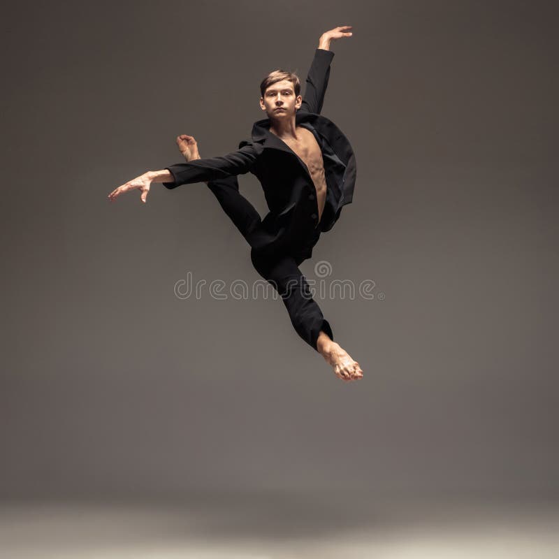 Man in Casual Office Style Clothes Jumping on Studio Background Stock ...