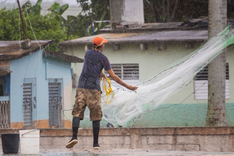 Man Catch a Fish Throw a Net in the Sea Cuba Editorial Image - Image of ...