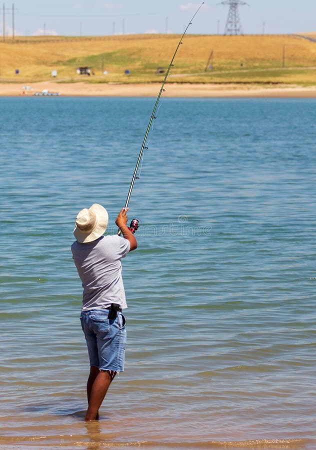A Man Catches Fish on the Lake Stock Image - Image of fishing ...
