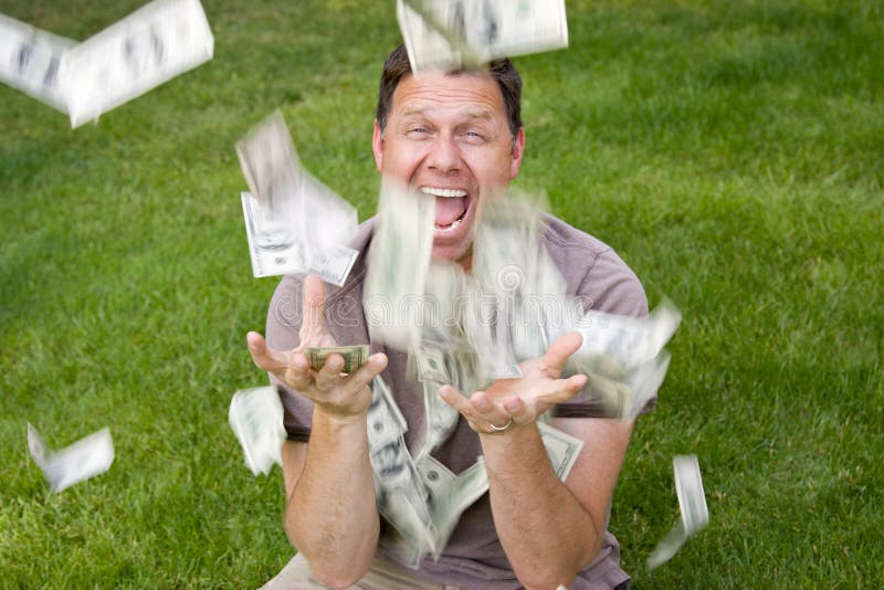 Man catching paper money stock photo. Image of income - 2635558
