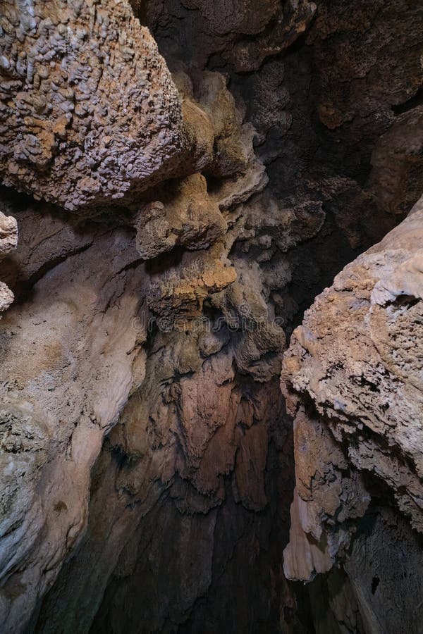 Man in a Cave with a Flashlight on His Head Stock Photo - Image of ...