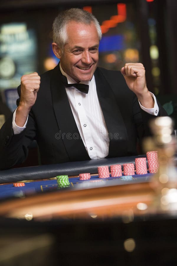 Man Celebrating Win at Roulette Table Stock Image - Image of gambler ...