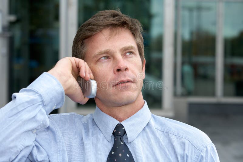 Man with cell phone stock image. Image of technology, gazing - 5212251
