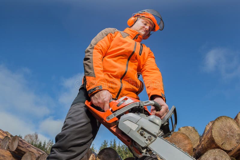 Man with chainsaw stock photo. Image of people, lumberman - 94540742