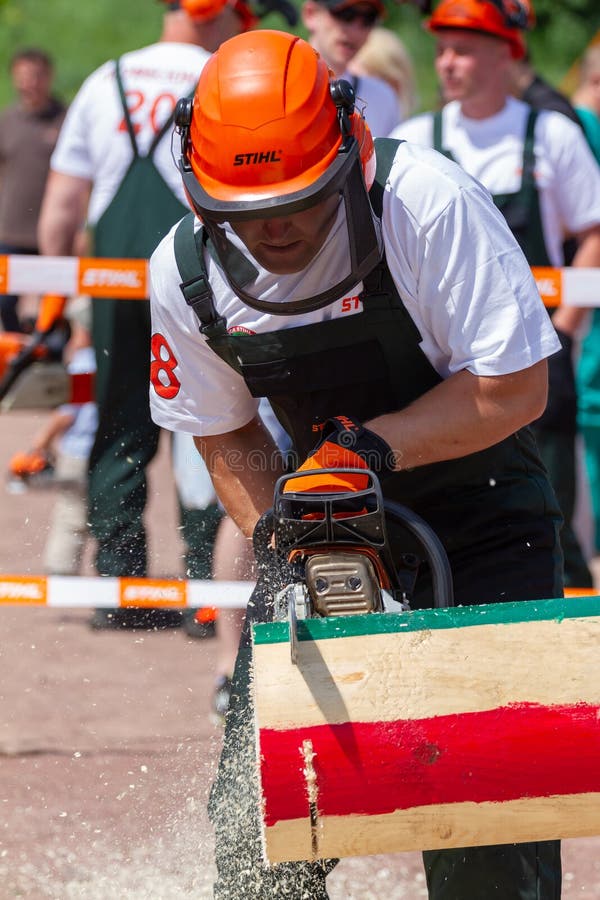 Man with Chainsaw Stihl Cutting the Tree Editorial Photography - Image ...