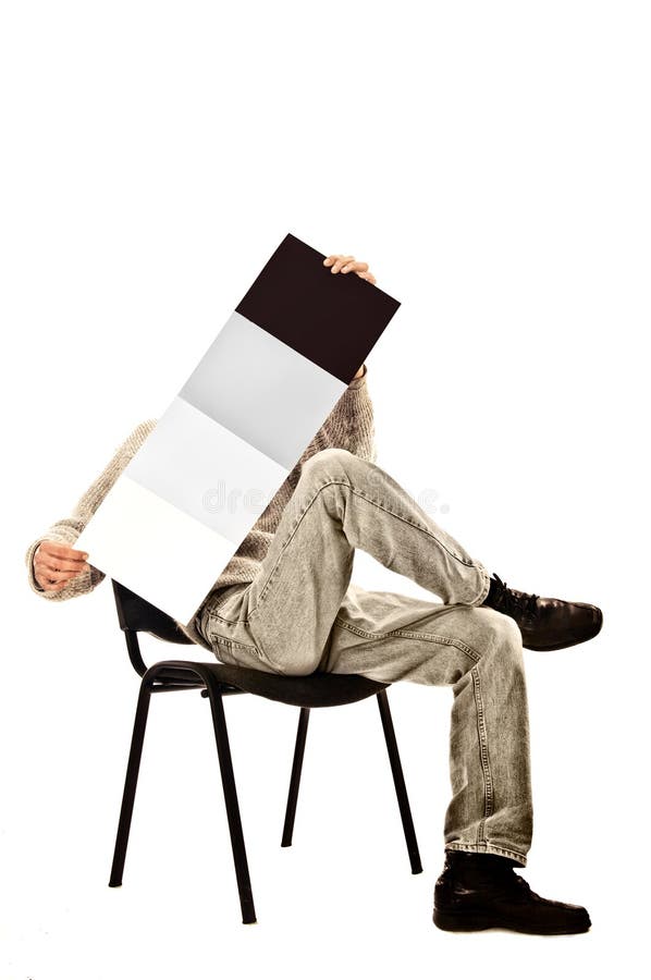 Man in a Chair with a Magazine Stock Photo - Image of life, looking ...