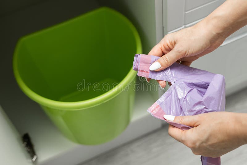A Man Changes a Garbage Bag in a Bucket. Stock Image - Image of process ...