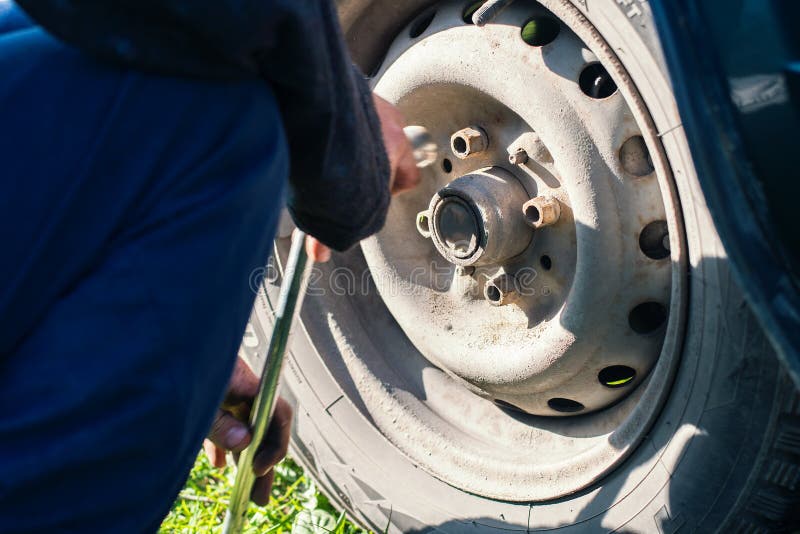 Service Workers Change Tires Stock Photos - Free & Royalty-Free Stock ...