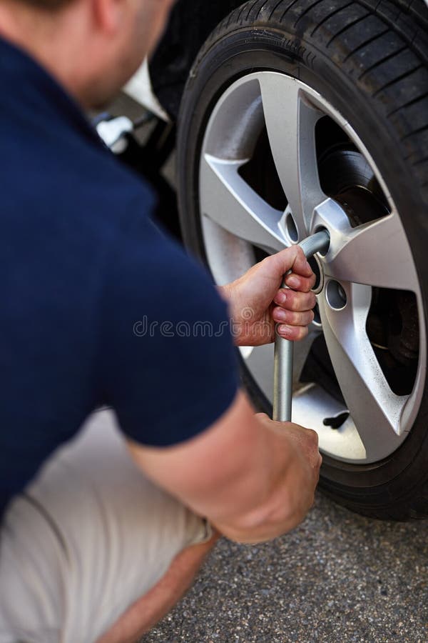 Man Changing Car Tire with Wheel Wrench Stock Photo - Image of problem ... Man Changing Car Tire with Wheel Wrench Stock Photo - Image of problem ...