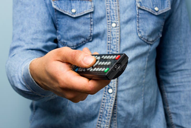Man changing the channel stock photo. Image of blue, concepts - 32323822