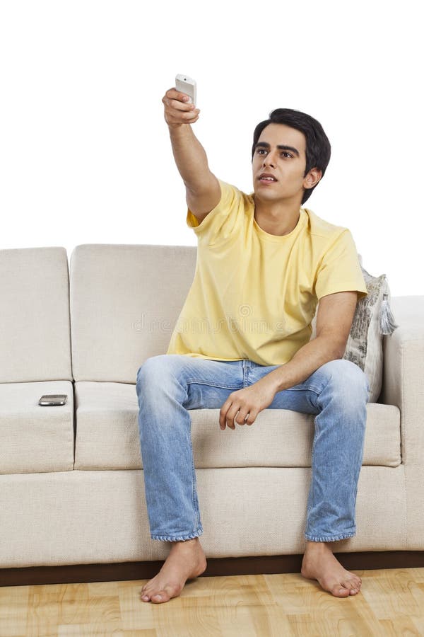 Man changing channels stock image. Image of domestic - 36376117