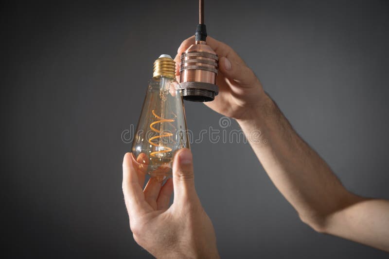 Man Changing Light Bulb at Home Stock Image - Image of save, light ...