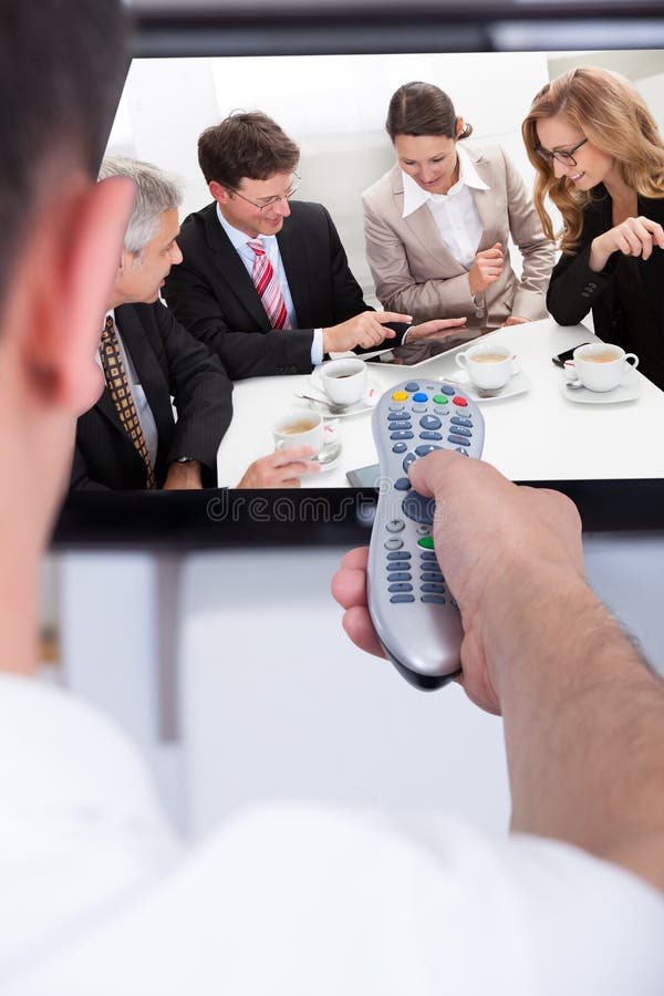 Man Changing Television Channel through Remote Stock Image - Image of ...
