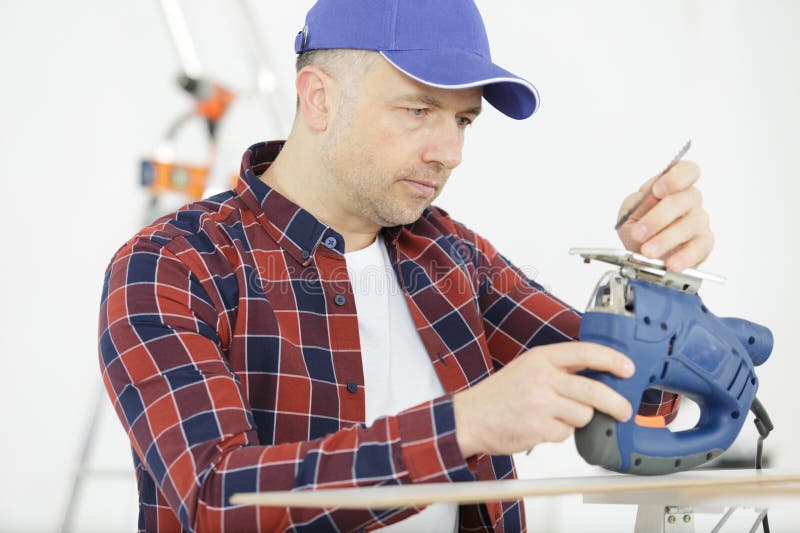 Man Changing Worker Saw Blade Stock Image - Image of renovation ...