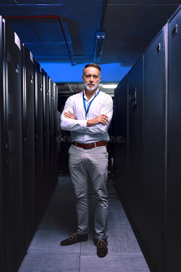 The Man in Charge of Digital Maintenance. Portrait of a Mature Man ...