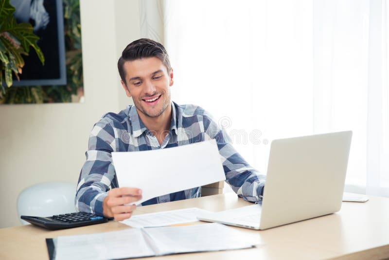 Man Checking Bills on the Tablet at Home Stock Photo - Image of ...