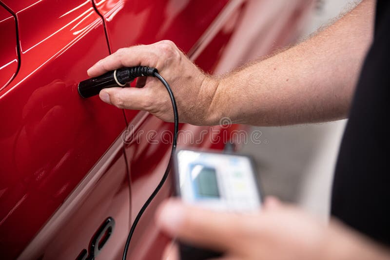Man Mechanic Checking Car Paint Thickness with Electronic Meter Stock ...