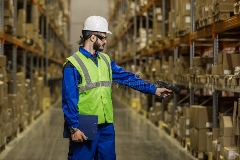 Worker Checking Boxes with Merchandise in Warehouse Stock Image - Image ...