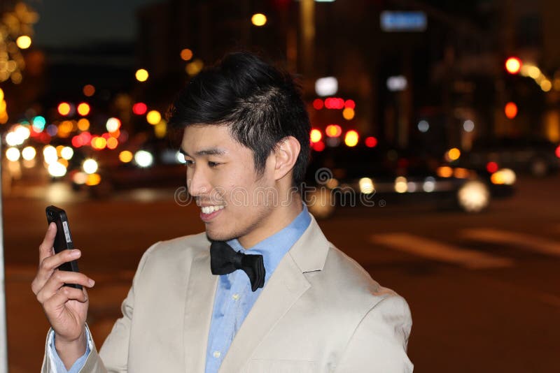 Man Checking His Phone in the City Streets Stock Photo - Image of ...