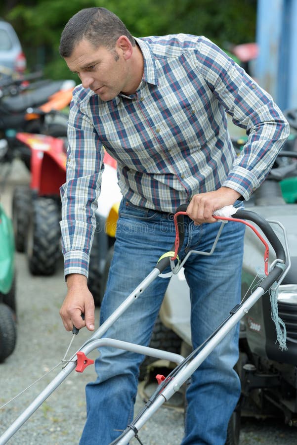 Man Checking Yard with Lawn Mower Stock Photo - Image of grass, care ...