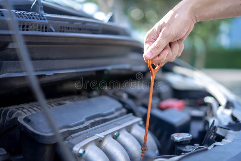 Man Checking the Oil Level in Car Engine, Check and Maintenance the Oil ...