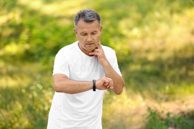 Man Checking Pulse Outdoors Stock Photo - Image of examination ...
