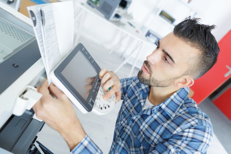 Man Checking Screen Printer Stock Image - Image of indoors, maintenance ...