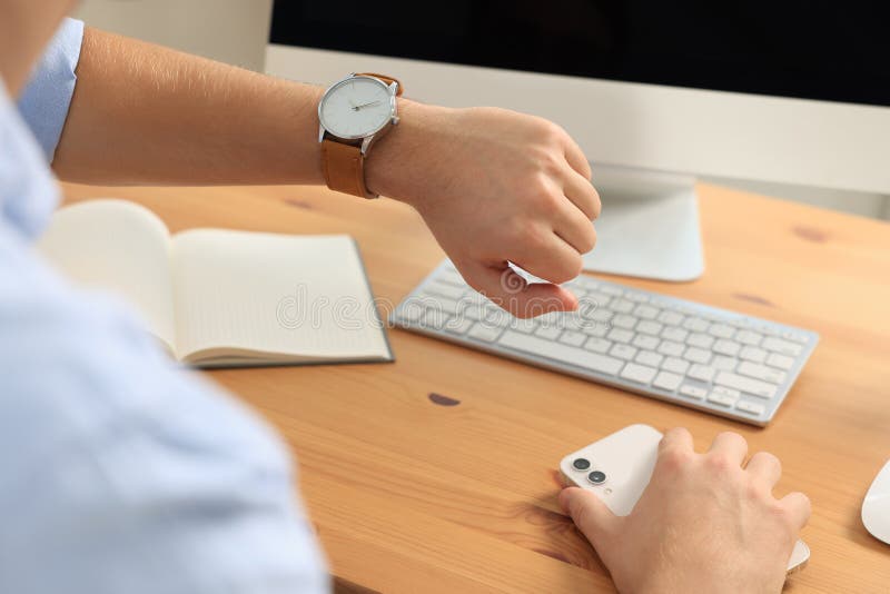 Man Checking Time at Desk in Office, Closeup. Being Late Stock Image ...